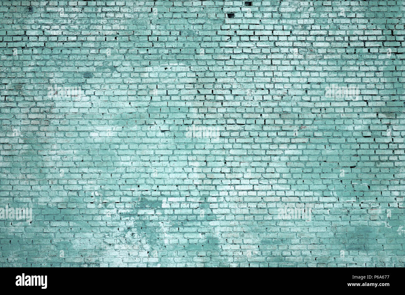 Square brick block wall background and texture. Painted in green Stock ...