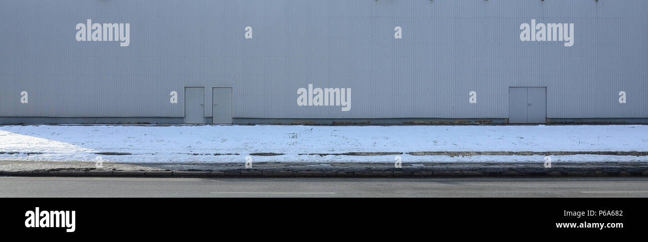Texture of a high metal wall of an industrial building without windows ...