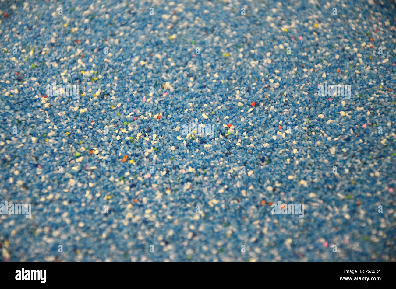Texture of a colored granular sand close up. Blue grains Stock Photo ...