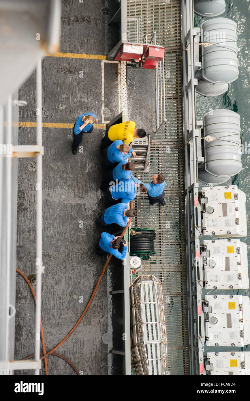 160526-N-MY174-026: MANILA, Philippines (May 26, 2016) - Sailors use a ...
