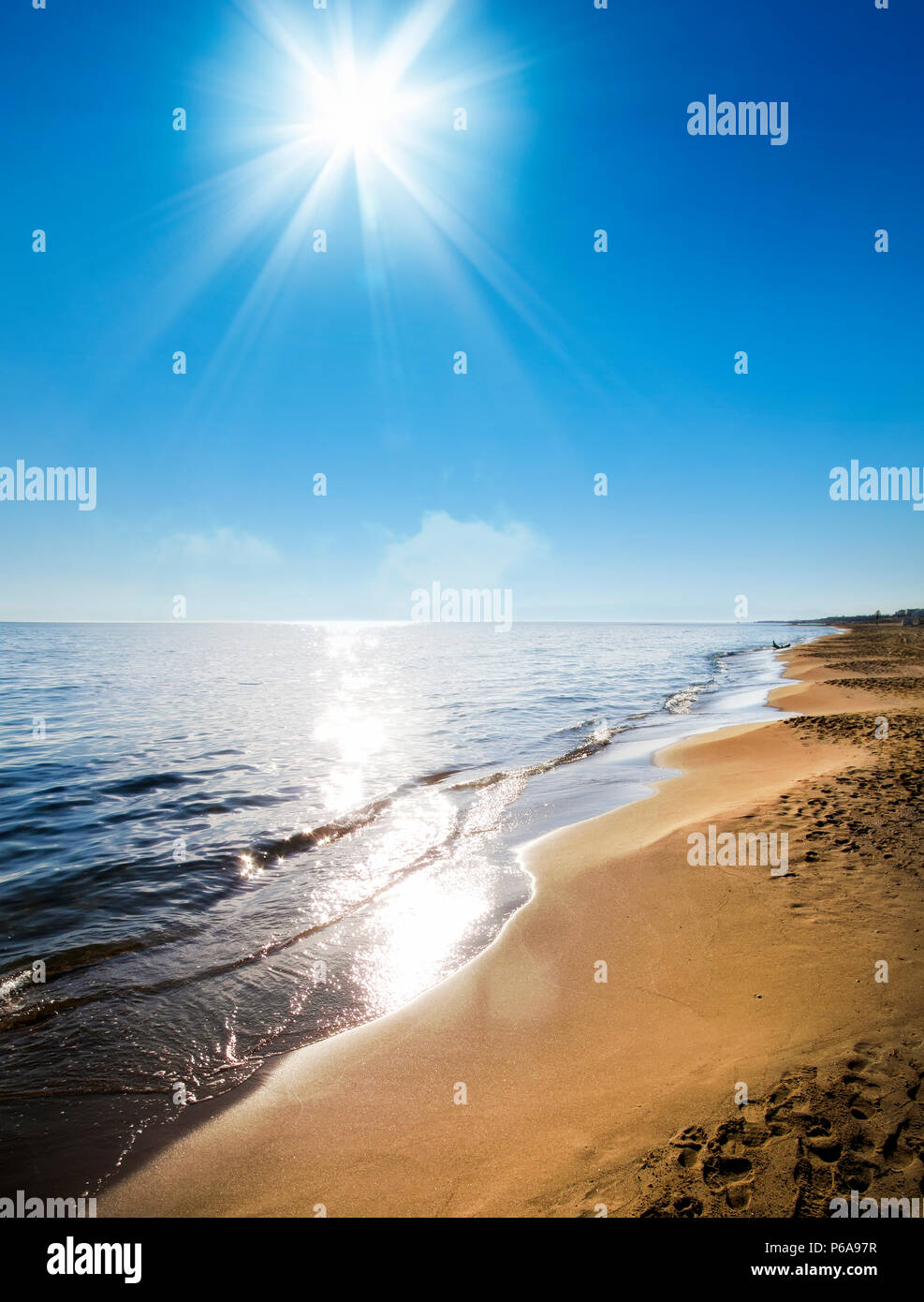 empty golden color sandy beach and sunny sky with sunbeam Stock Photo ...