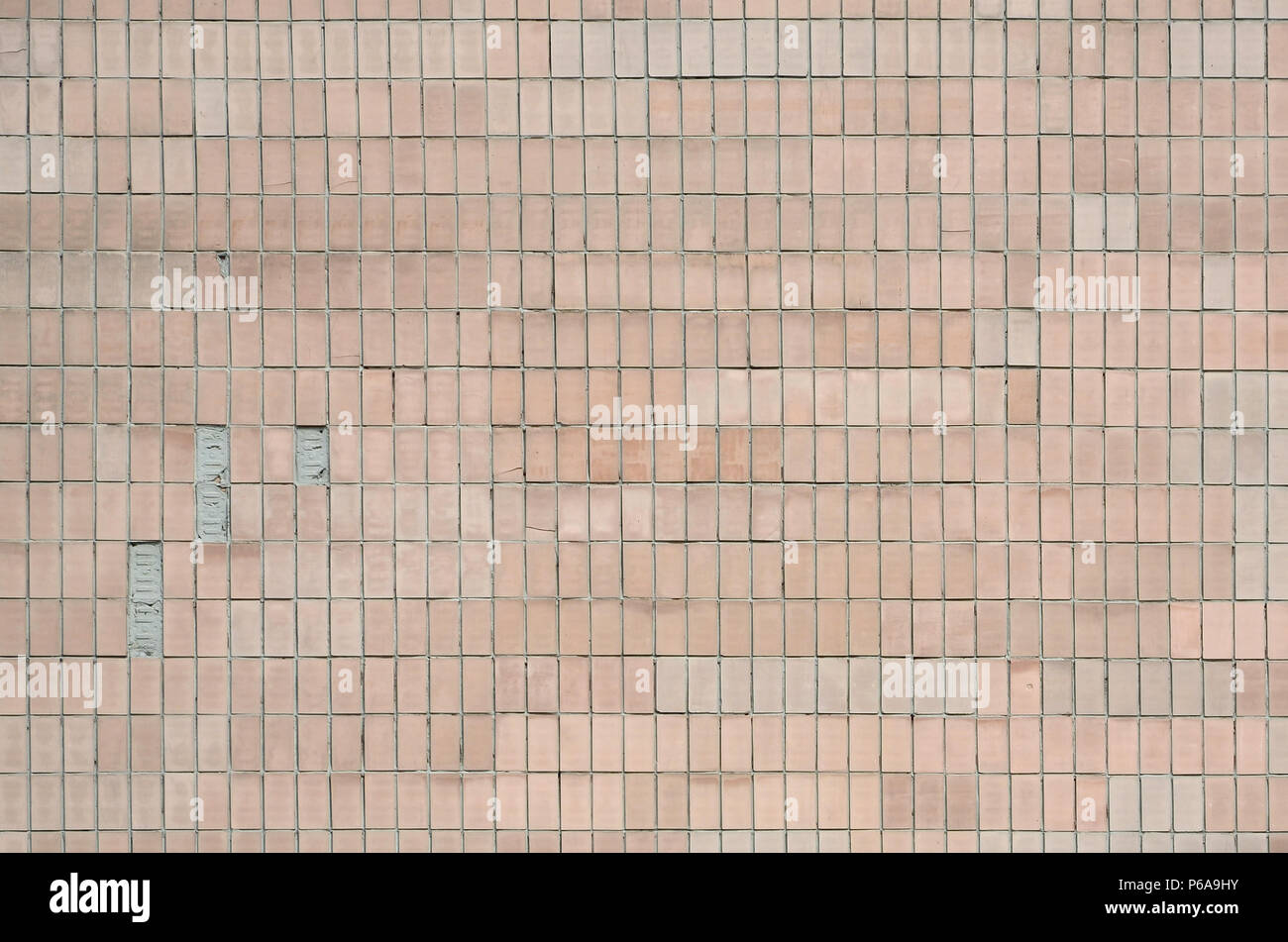 Old Soviet beige wall tiles. The texture of the classical outer tile ...