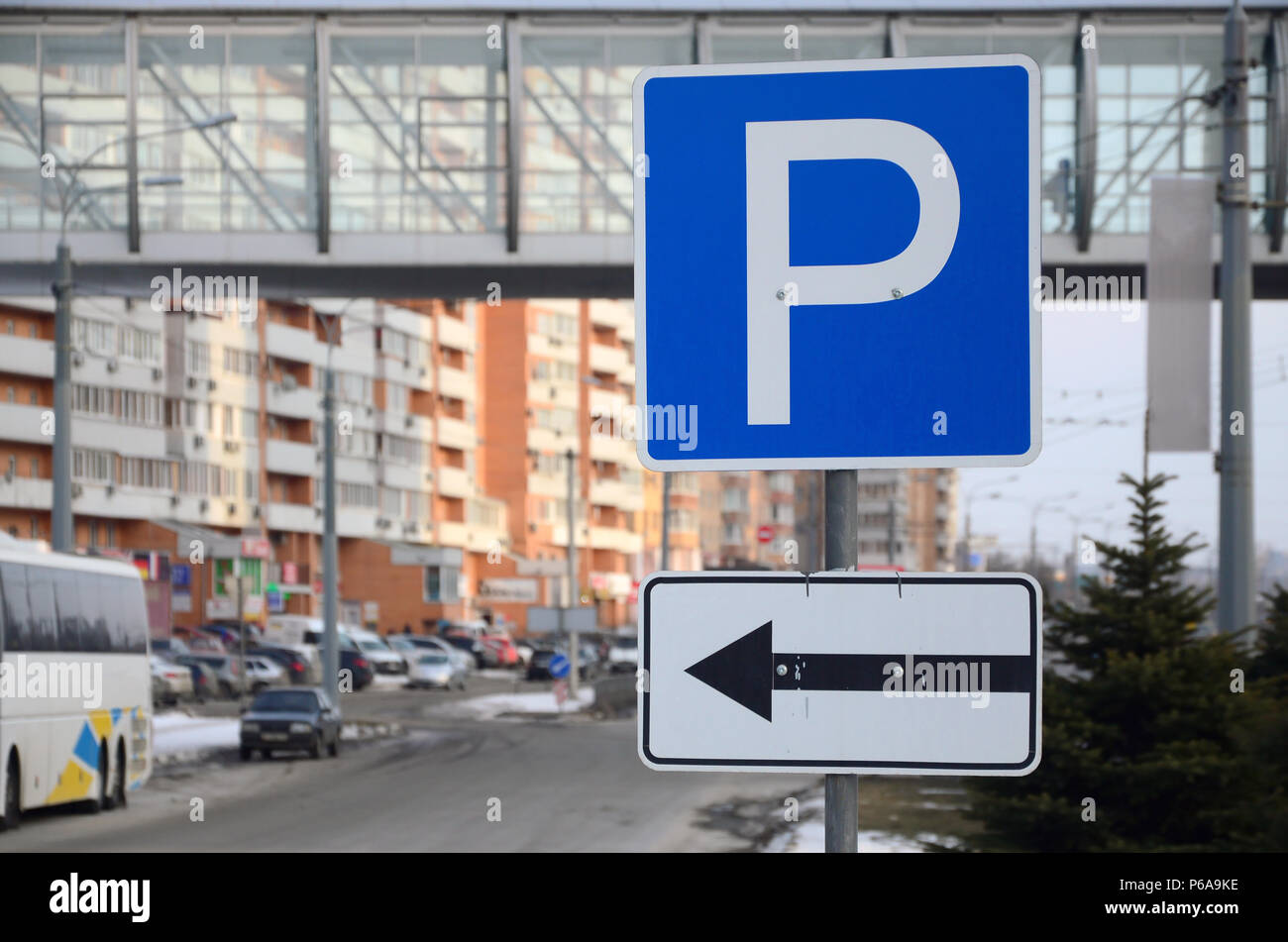 Parking left. Traffic sign with the letter P and the arrows to the left ...