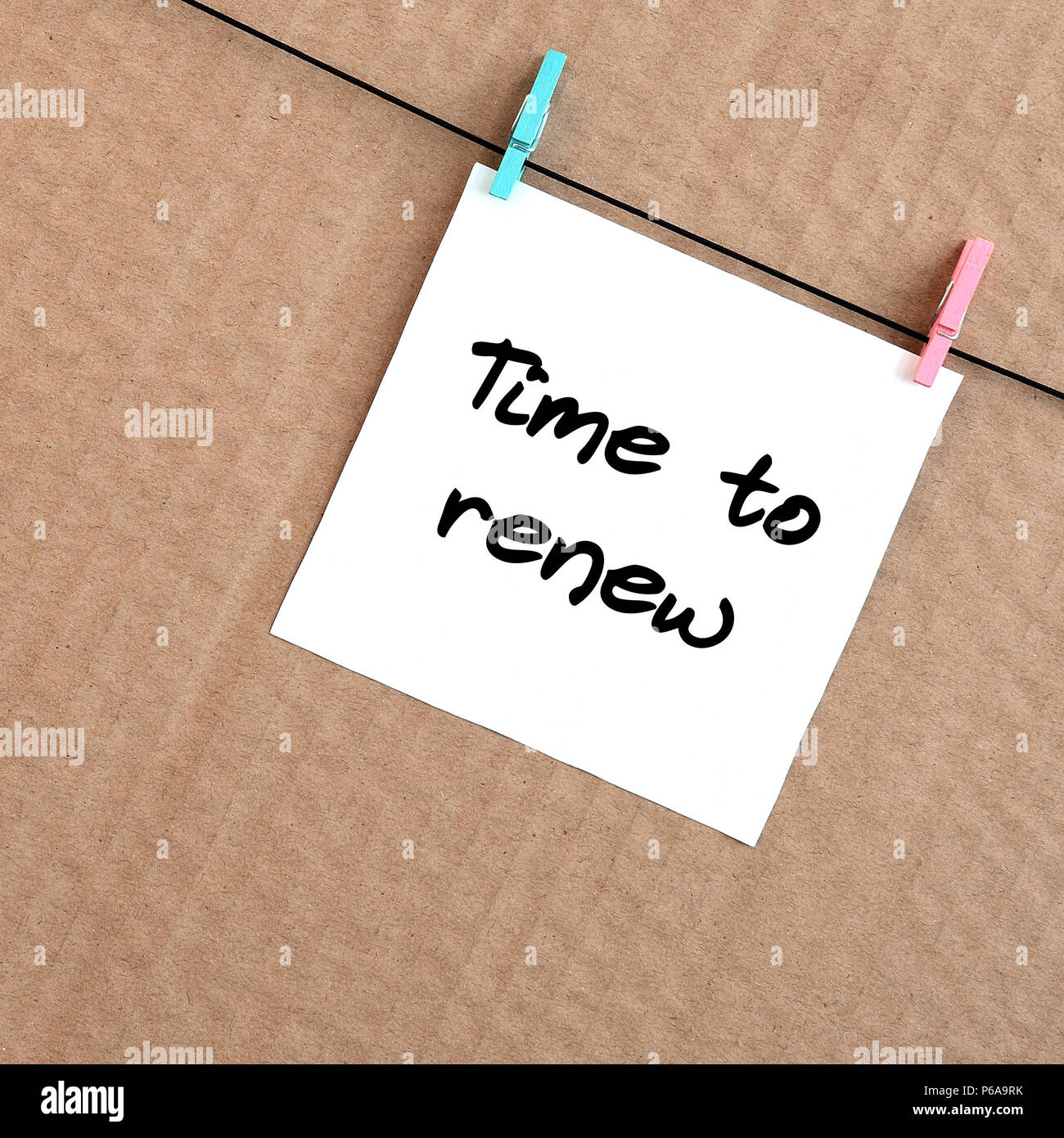 Time to renew. Note is written on a white sticker that hangs with a ...