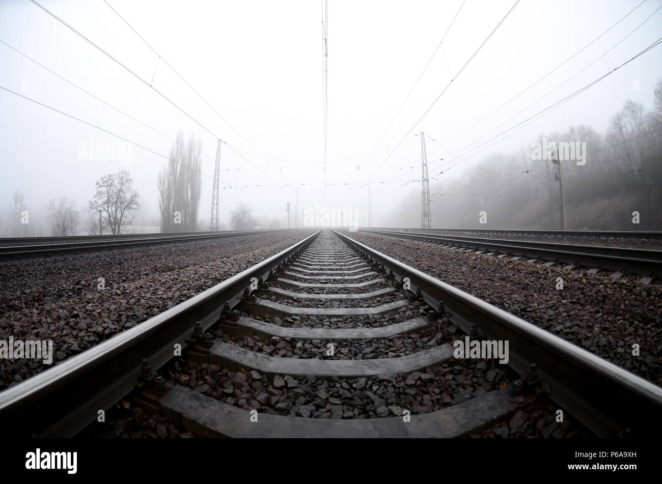 Rail tracks in misty forest hi-res stock photography and images - Alamy