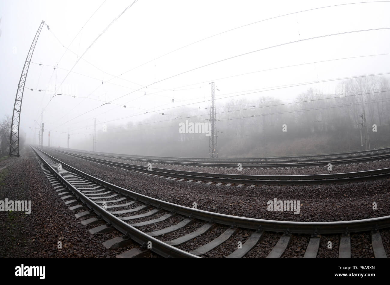 Rail tracks in misty forest hi-res stock photography and images - Alamy
