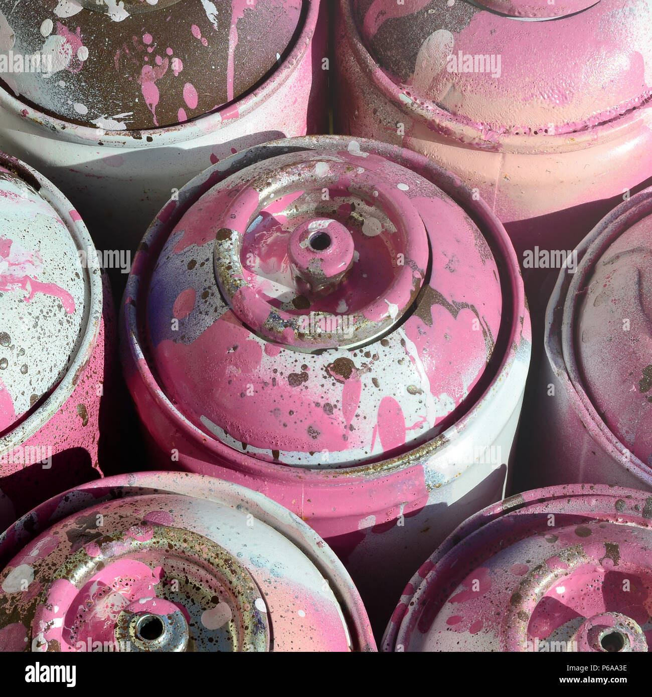 A lot of used pink metal tanks with paint for drawing graffiti Stock ...