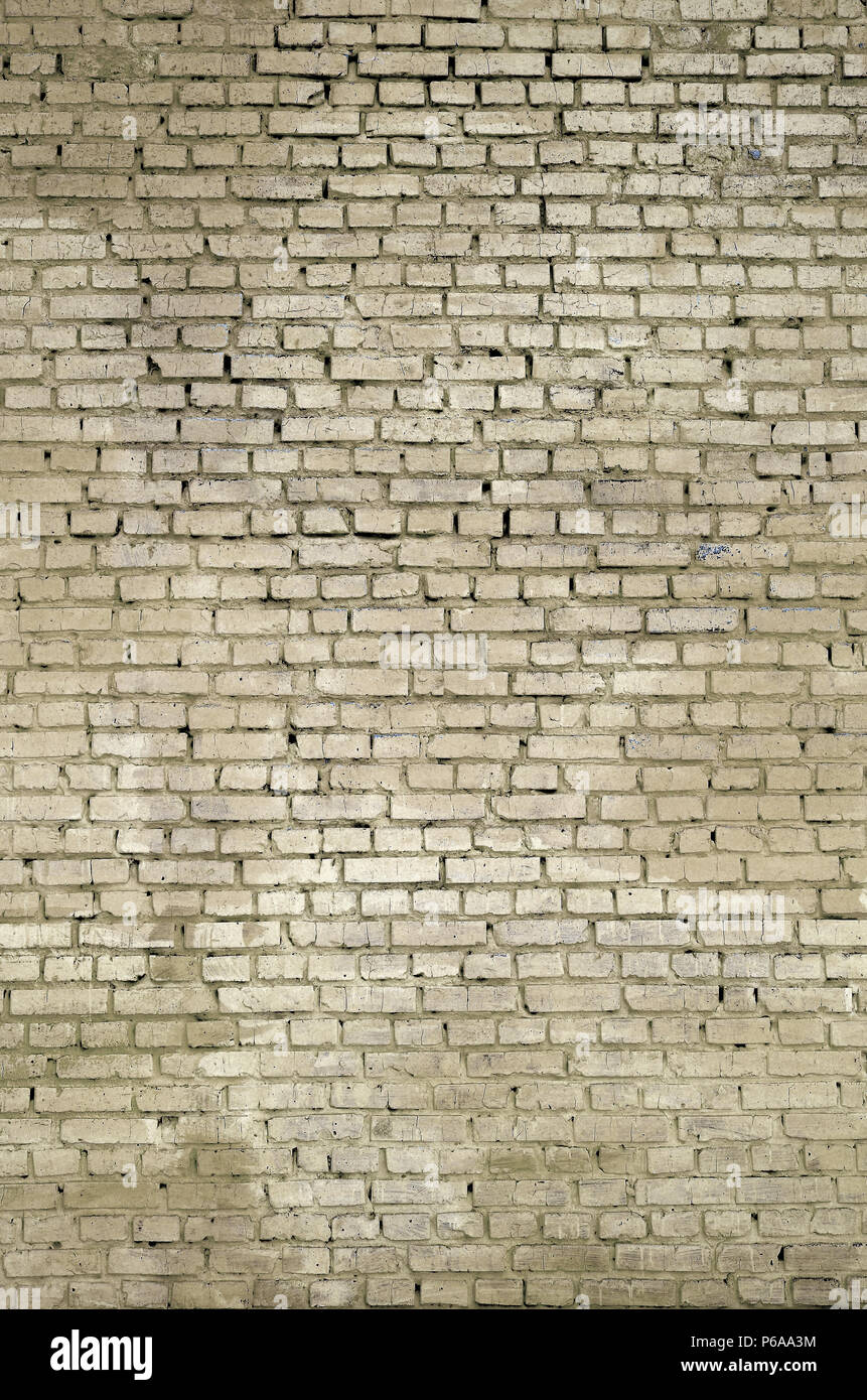 Square brick block wall background and texture. Painted in yellow Stock ...