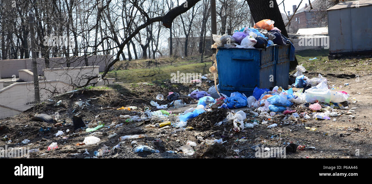 The garbage can is packed with garbage and waste. Untimely removal of ...