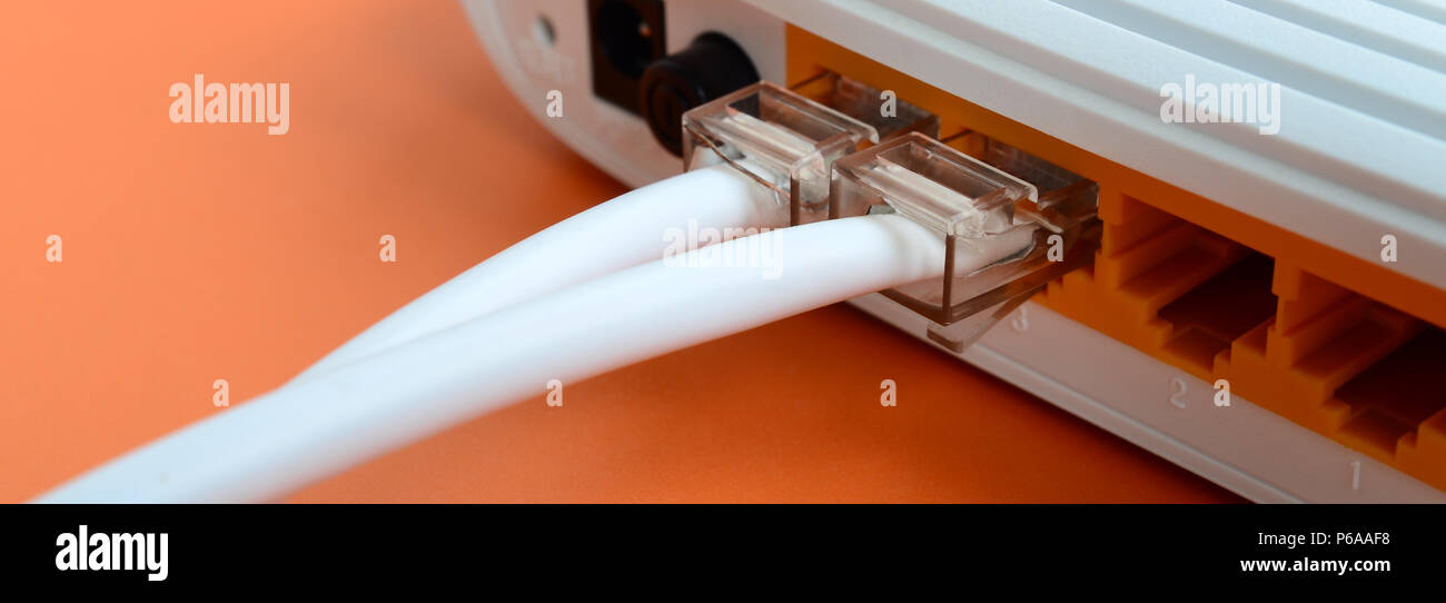 The Internet cable plugs are connected to the Internet router, which ...