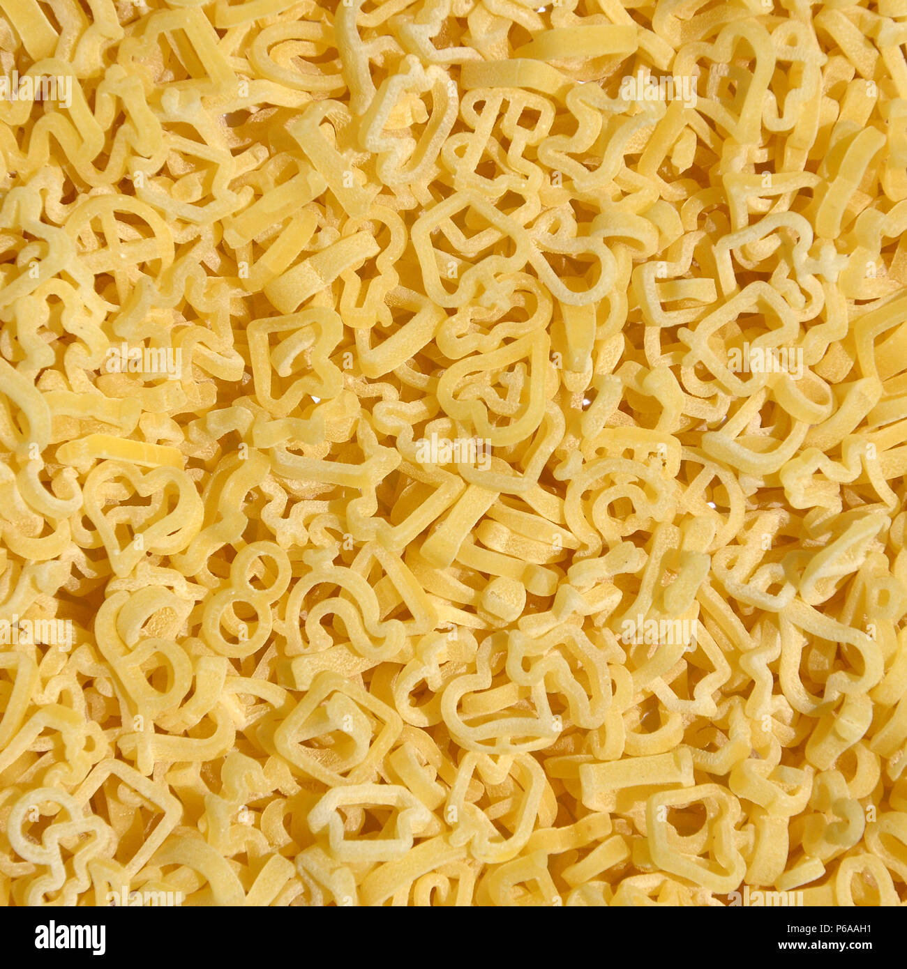 Uncooked curly pasta pattern hi-res stock photography and images - Alamy