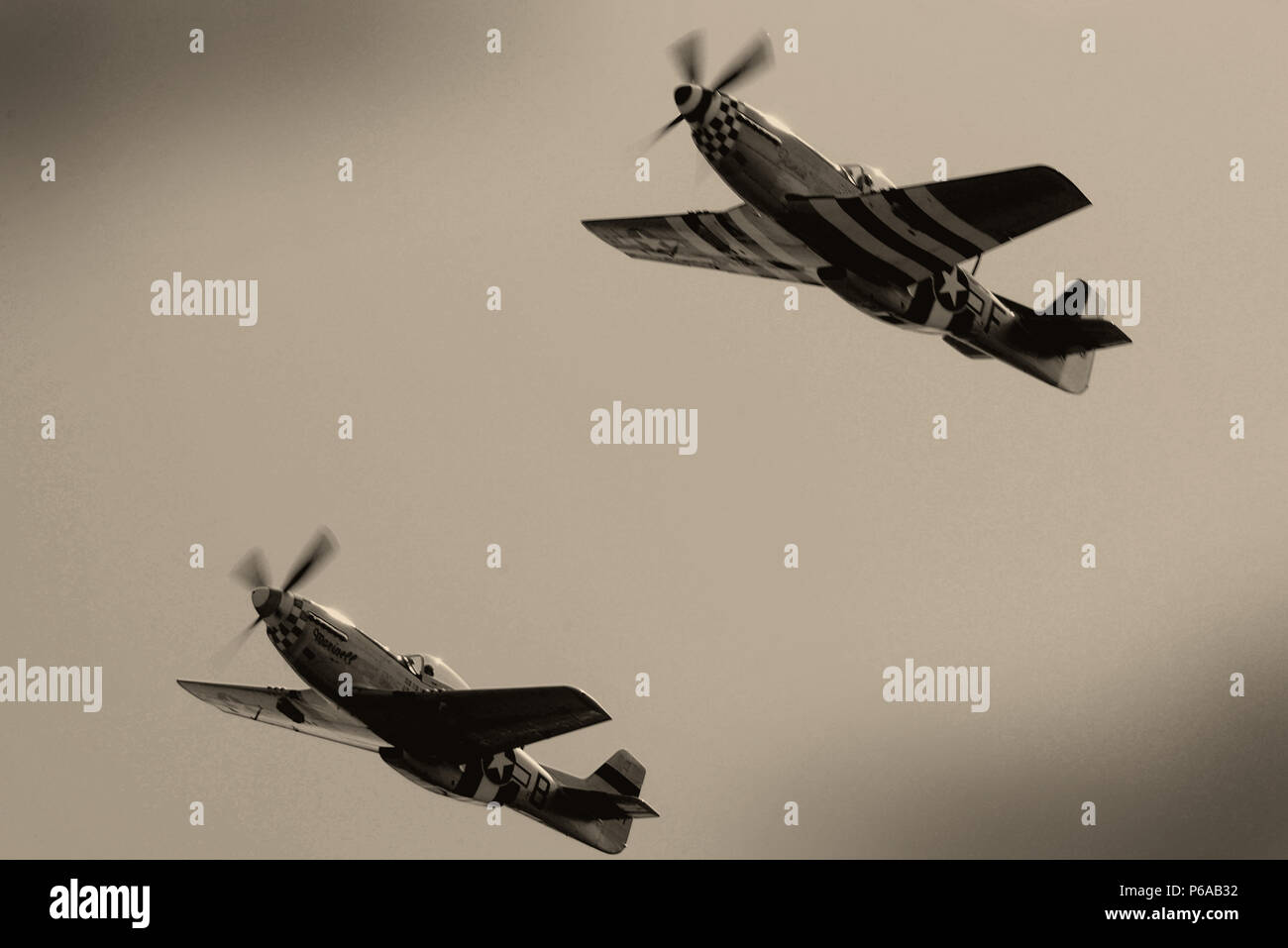 Two P-51 Mustang’s perform a flyover during the unveiling of the 490th ...