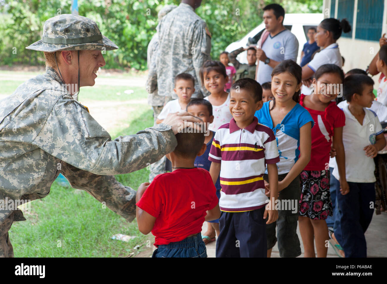 U.S. Army Spc. Michael Rutledge, left, assigned to the 345th ...