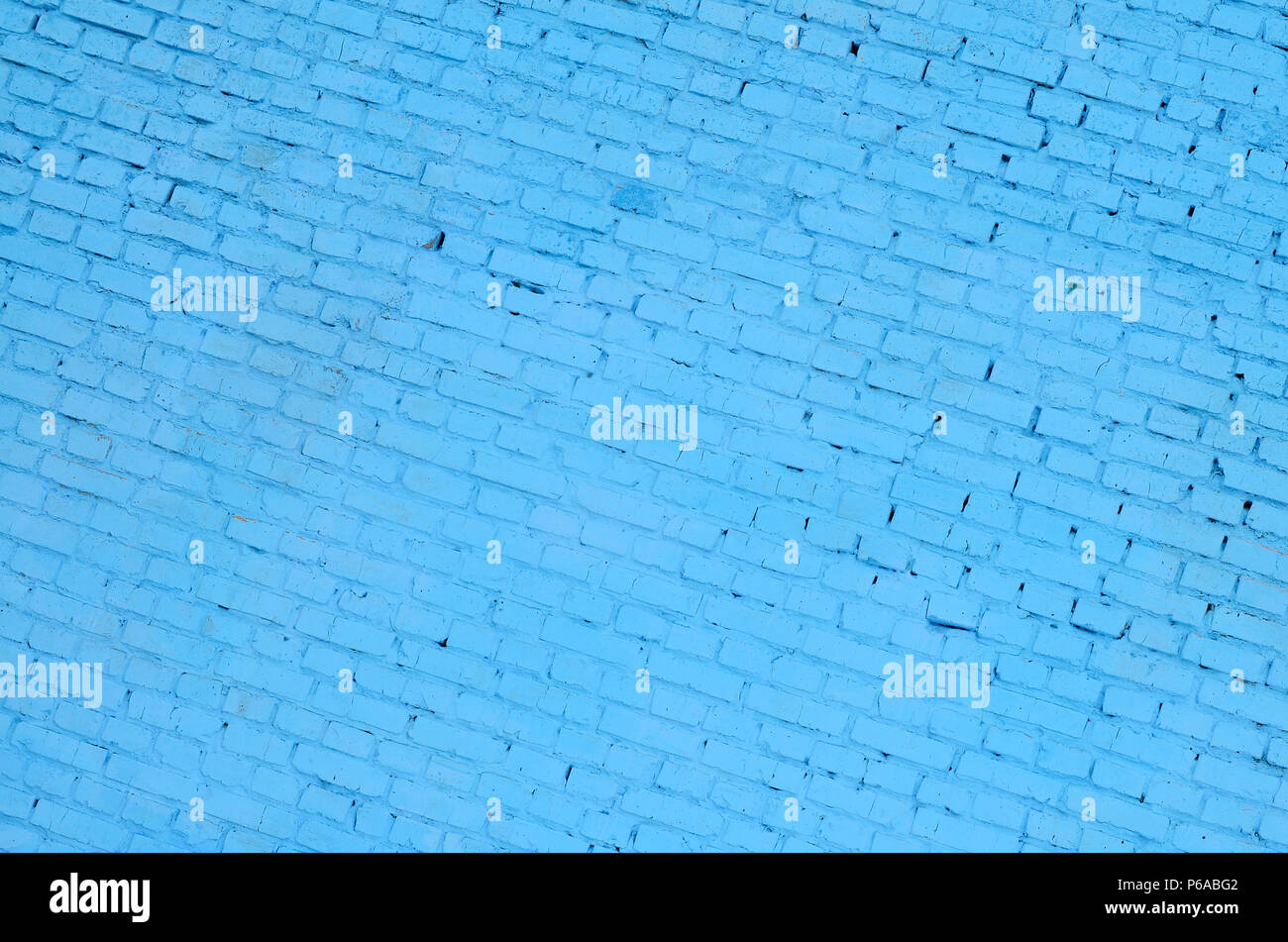 Square brick block wall background and texture. Painted in blue Stock ...