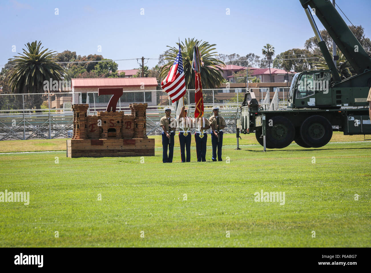 U.S. Marines with the 1st Marine Logistics Group gather for a change of ...