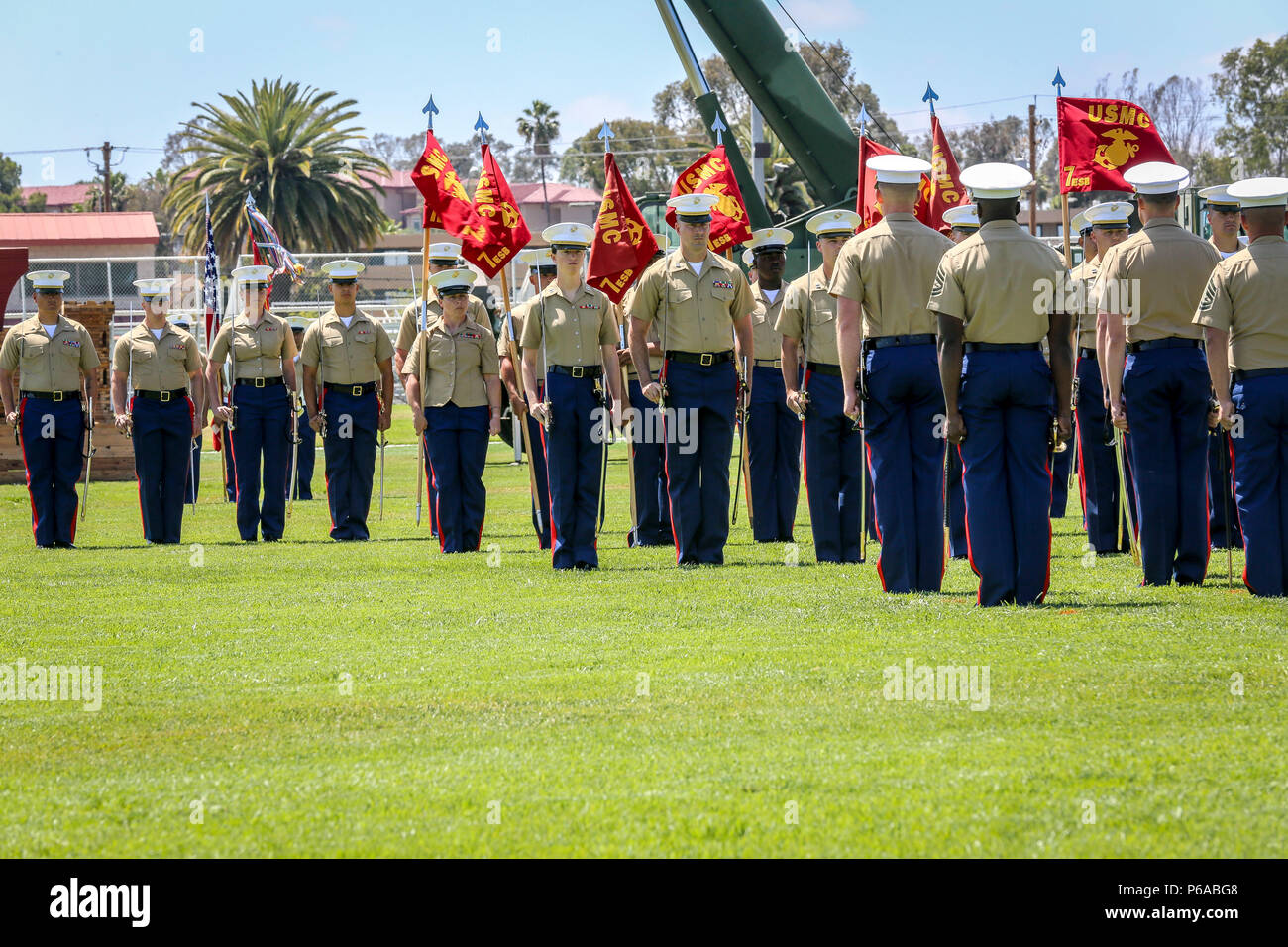 U.S. Marines with the 1st Marine Logistics Group gather for a change of ...