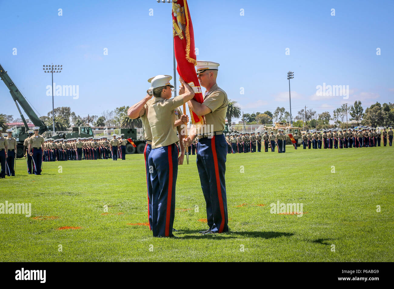 U.S. Marine Lt. Col. Jennifer A. Nash receives the unit colors from Lt ...
