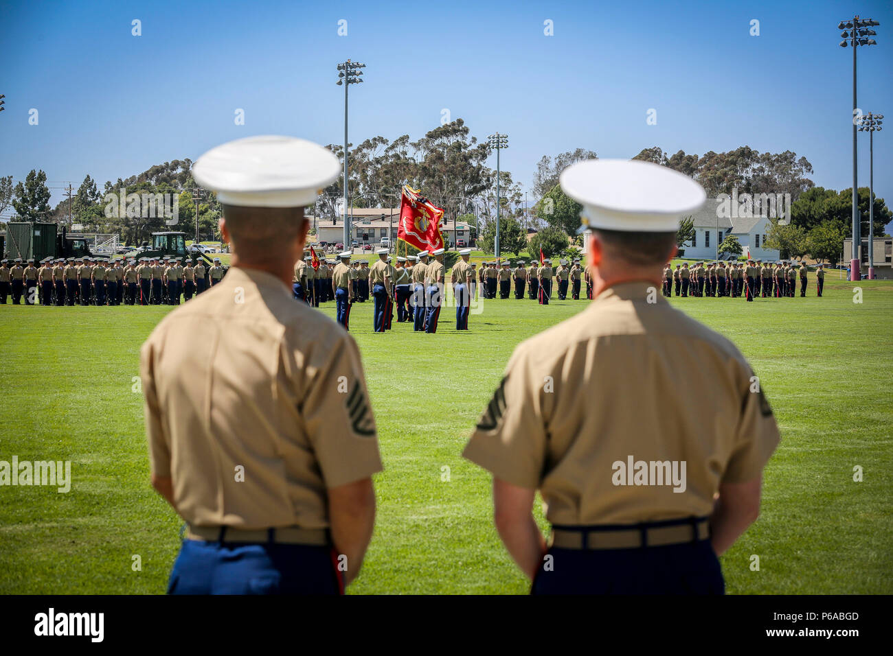 U.S. Marines with the 1st Marine Logistics Group gather for a change of ...