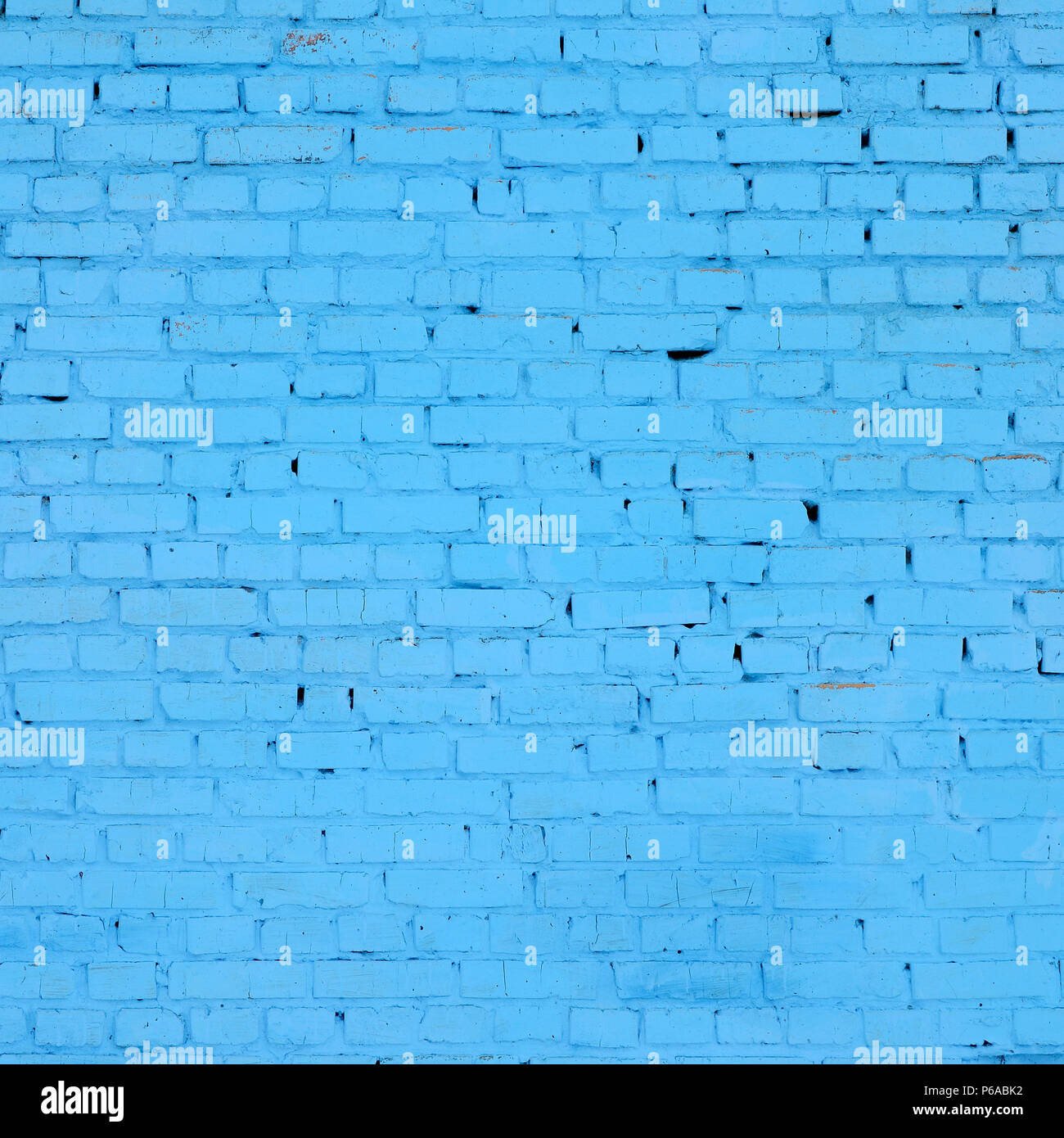 Square brick block wall background and texture. Painted in blue Stock ...