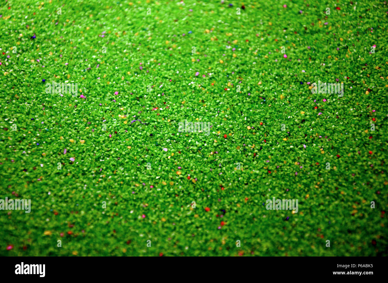 Texture of a colored granular sand close up. Green grains Stock Photo ...