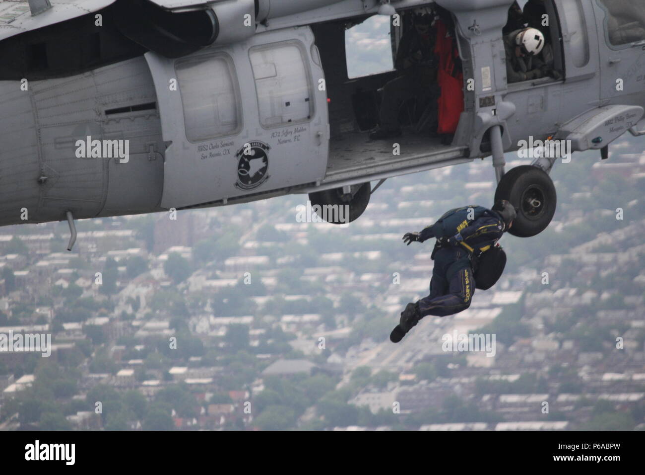160530-N-BG563-004 A member of the Navy Parachute Team, the Leap Frogs ...