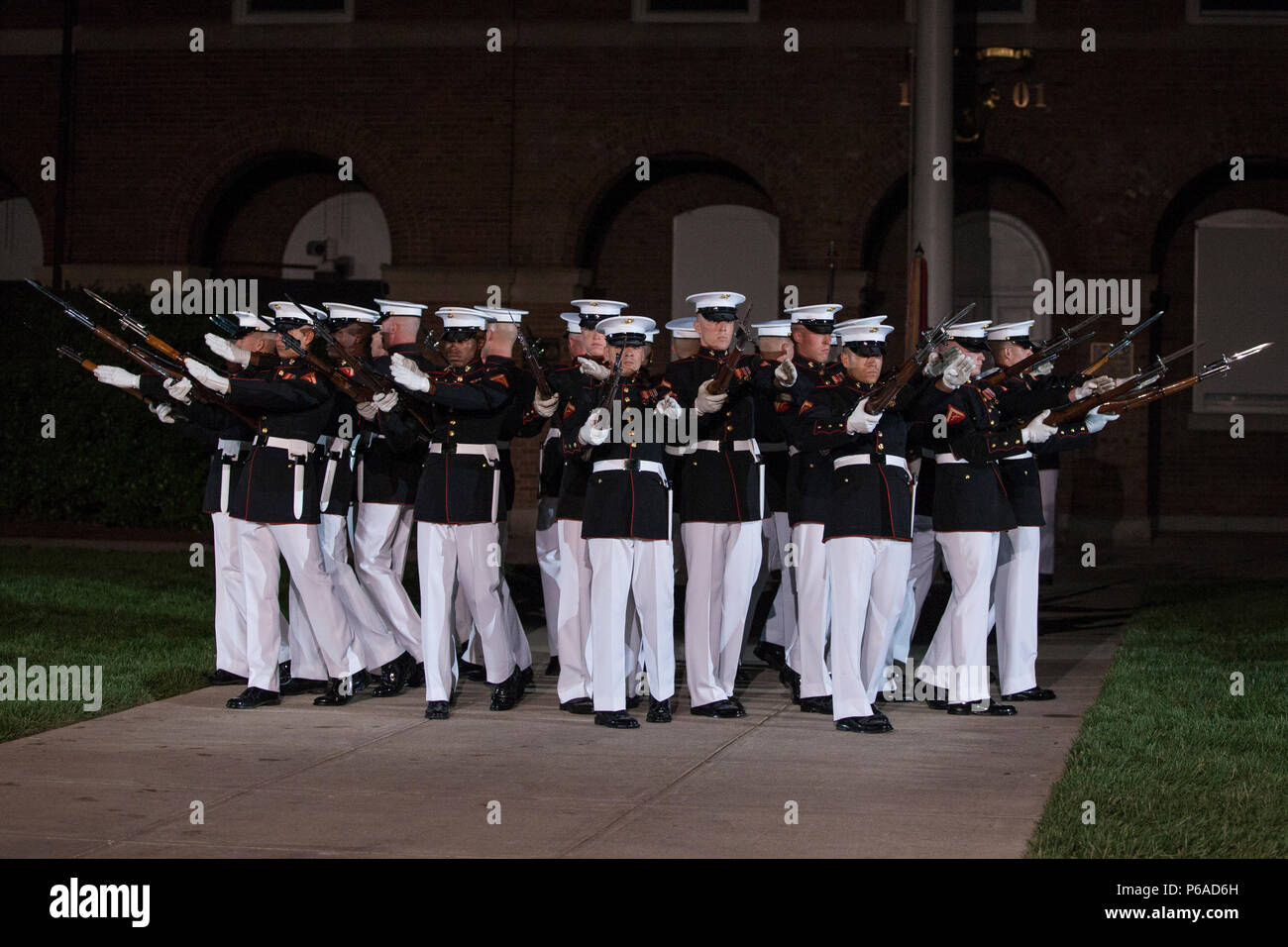 The U.S. Marine Corps Silent Drill Platoon preforms during the evening ...