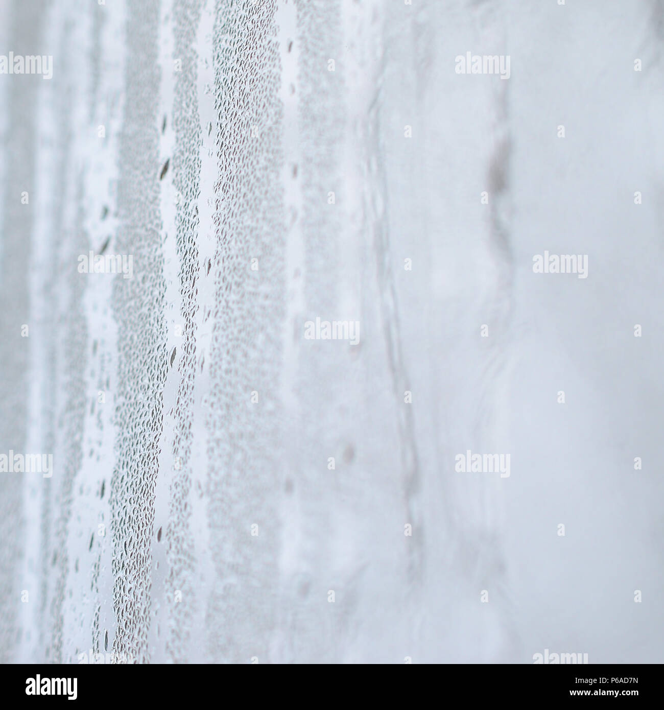 The texture of a misted glass with a lot of drops and condensation ...