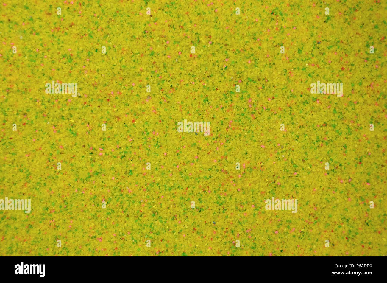 Texture of a colored granular sand close up. Yellow grains Stock Photo ...