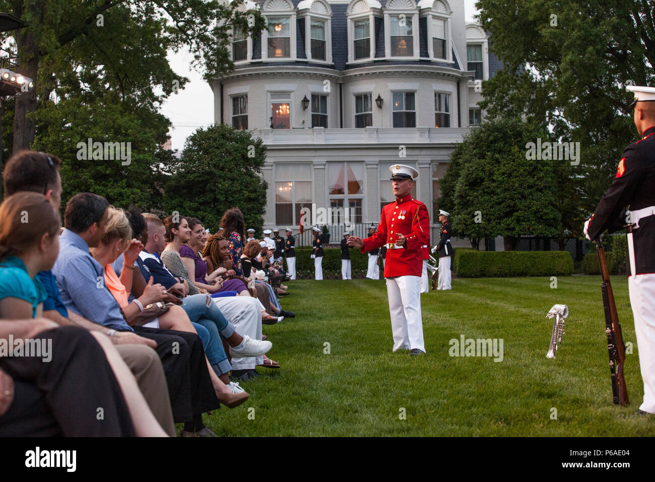 U.S. Marines with Marine Barracks Washington (MBW) educate the crowd on ...