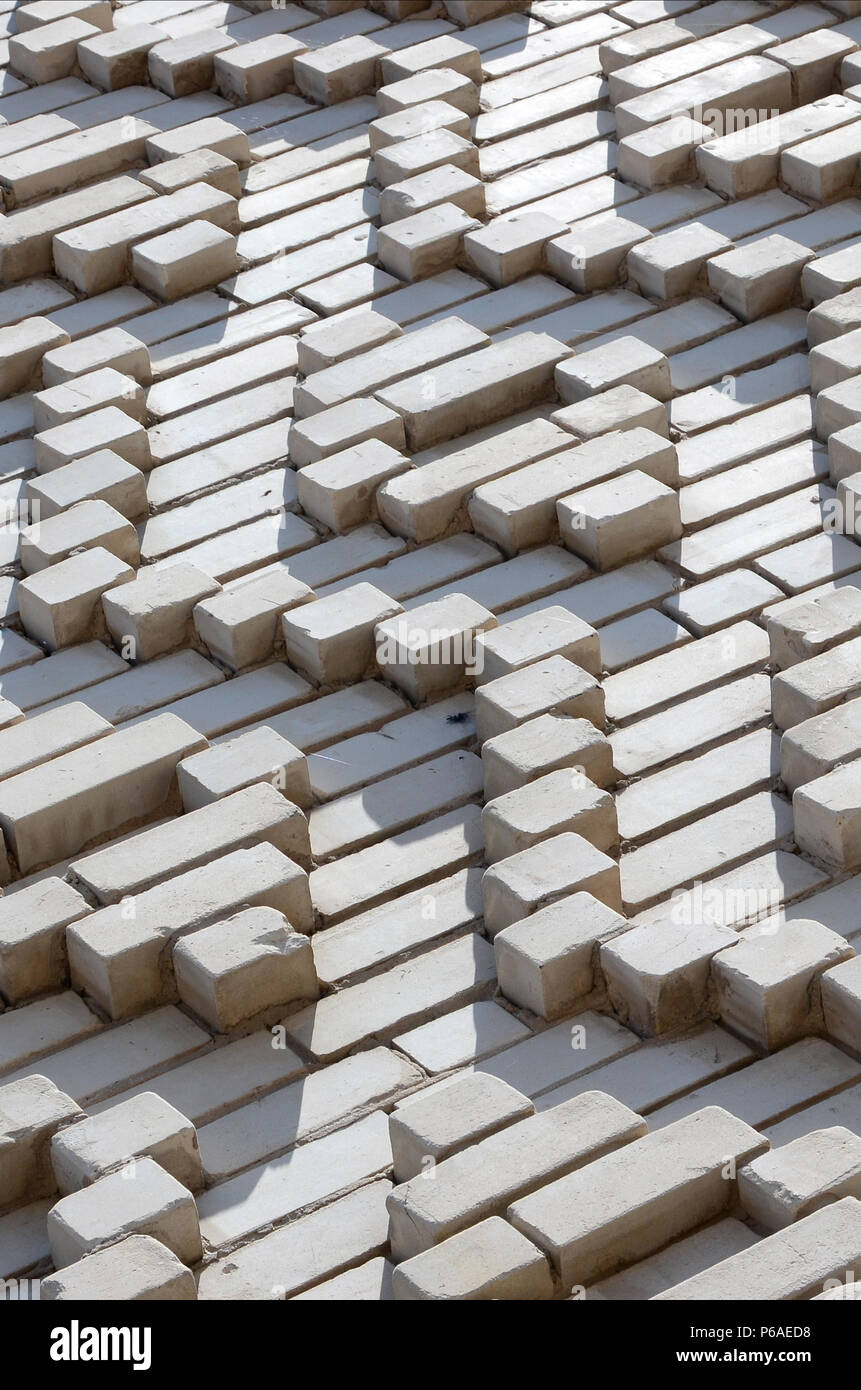 A pattern made of white bricks in the form of diamond shapes ...
