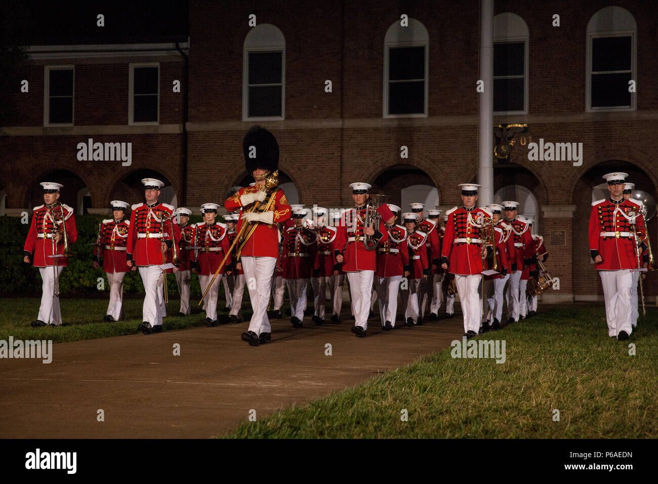 Members of the U.S. Marine Band perform during an evening parade at ...