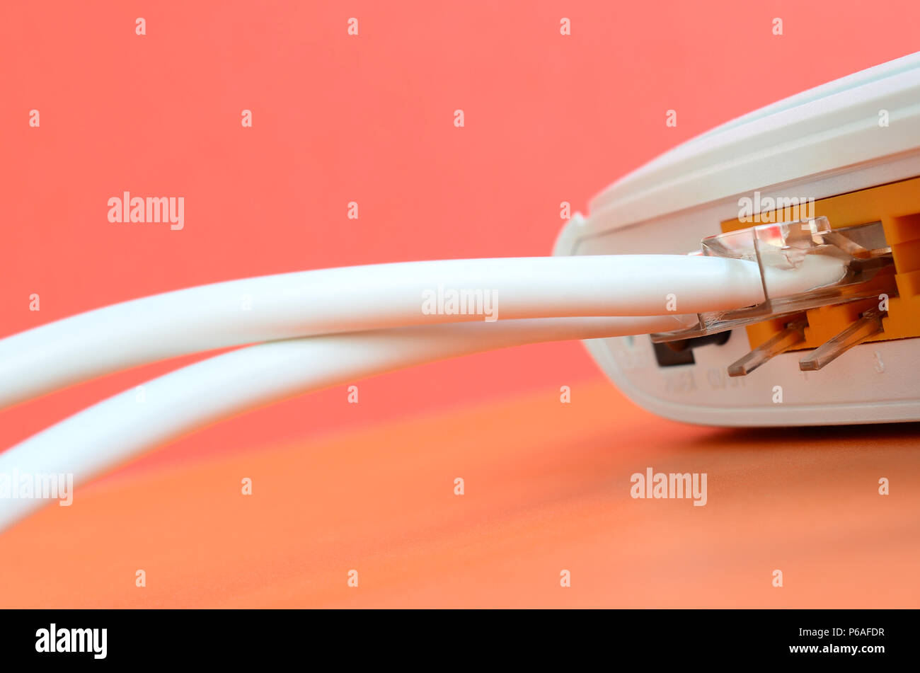 The Internet cable plugs are connected to the Internet router, which ...