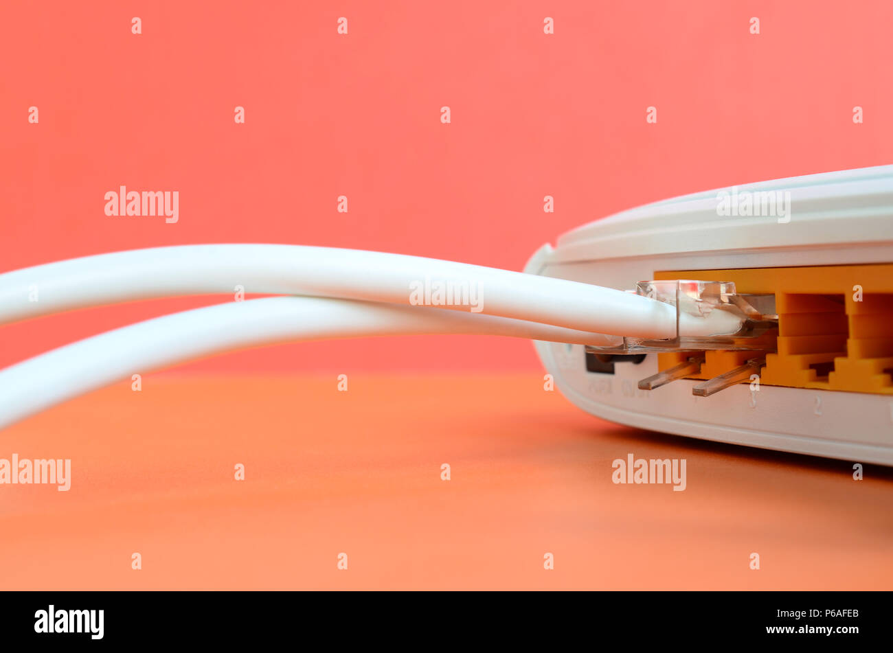 The Internet cable plugs are connected to the Internet router, which ...