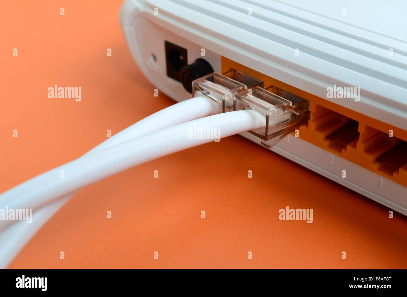 The Internet cable plugs are connected to the Internet router, which ...