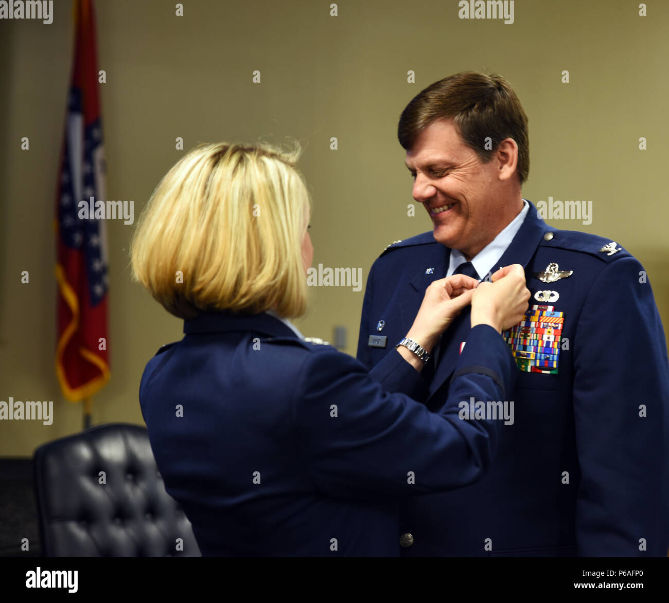 Col. Brian T. Burger, commander of the 188th Operations Group, receives ...