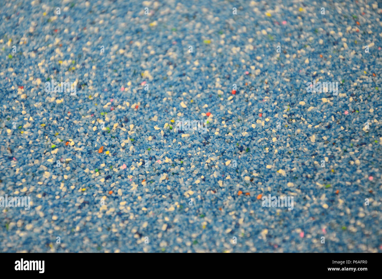 Texture of a colored granular sand close up. Blue grains Stock Photo ...