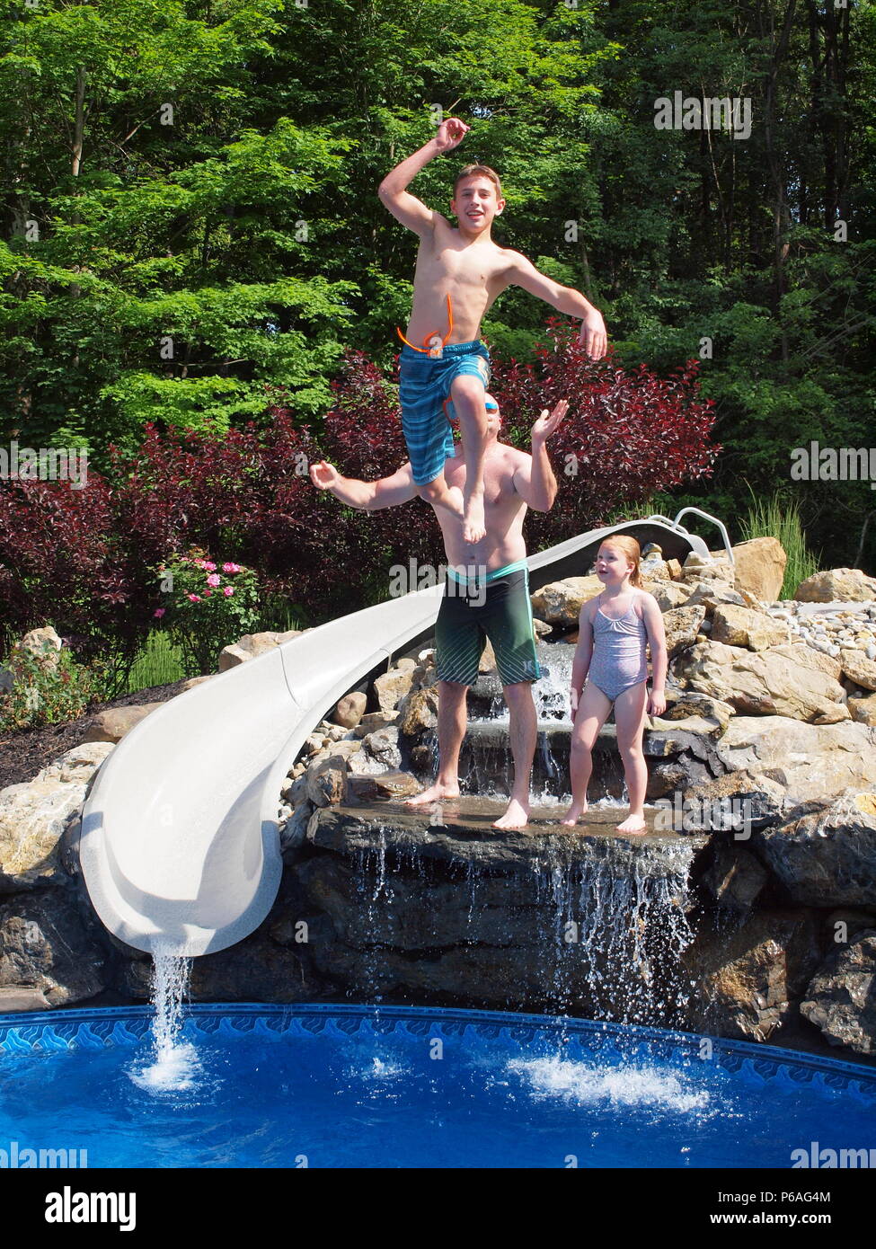 Swimming pool antics Stock Photo - Alamy