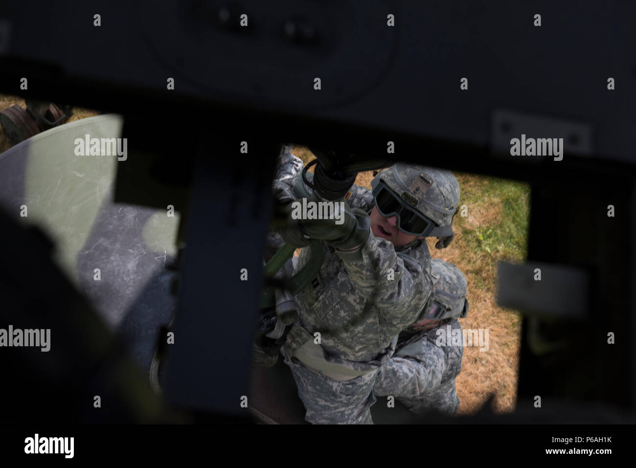 U.S. Army Capt. Patrick Flynn, assigned to Alpha Company, 186th Brigade ...