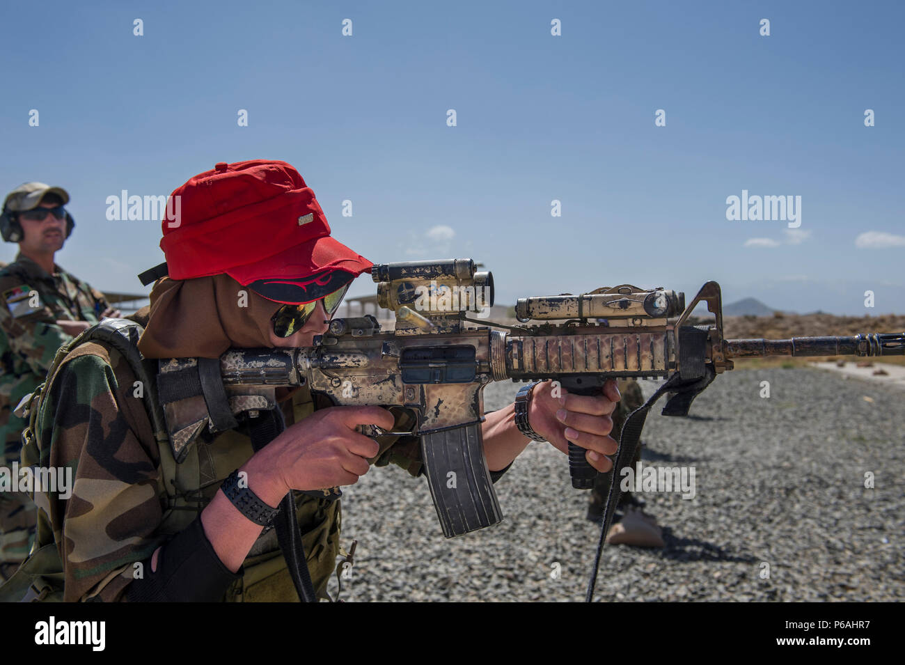 A Ktah Khas Afghan Female Tactical Platoon member participates in a ...