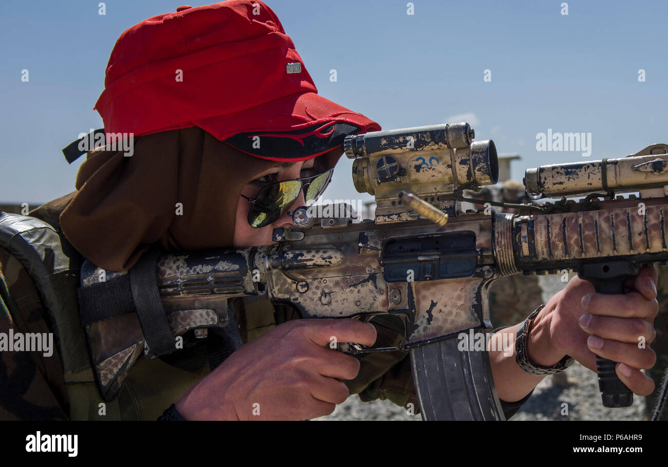 A Ktah Khas Afghan Female Tactical Platoon member participates in a ...