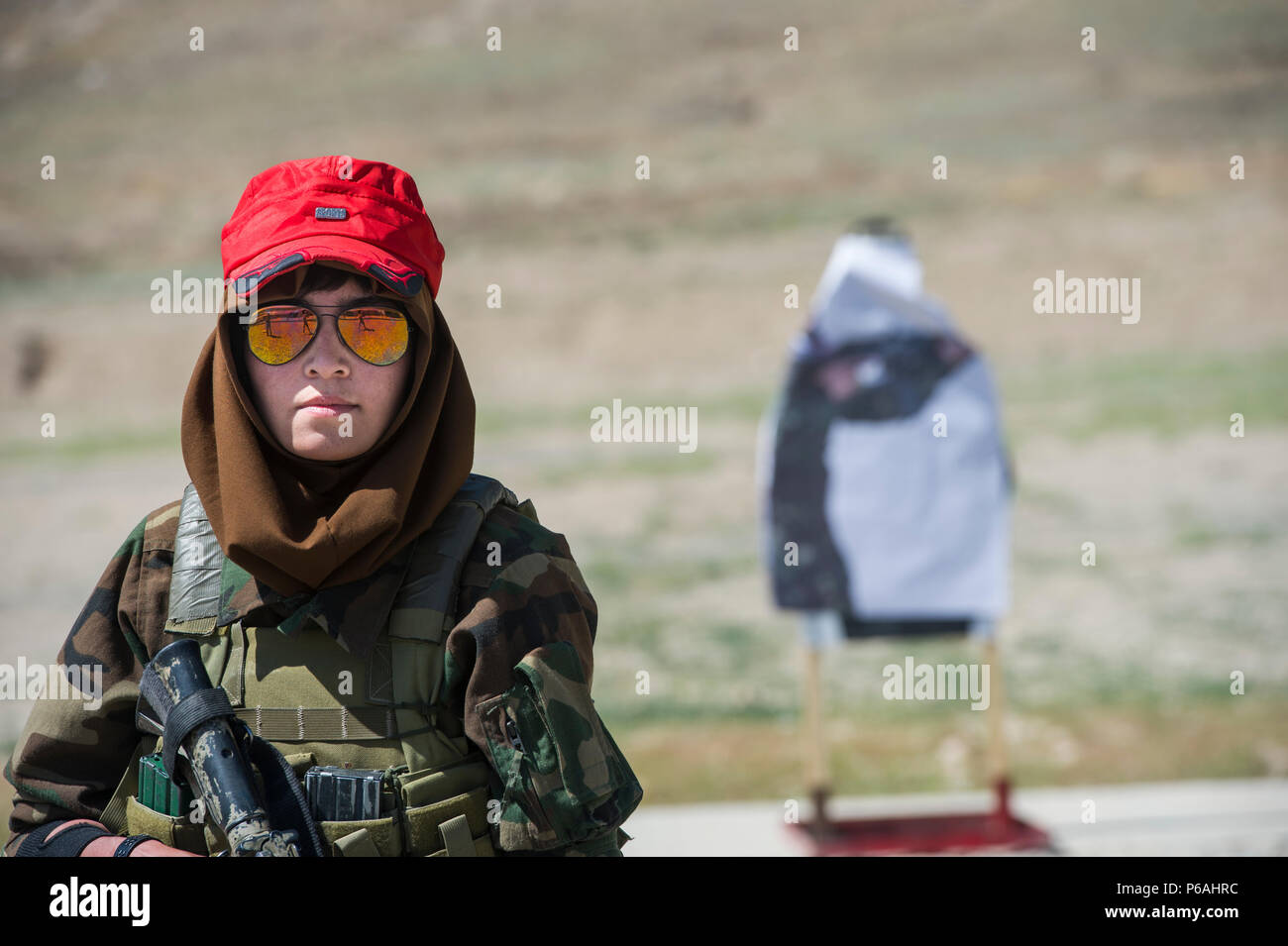 A Ktah Khas Afghan Female Tactical Platoon member waits for a whistle ...