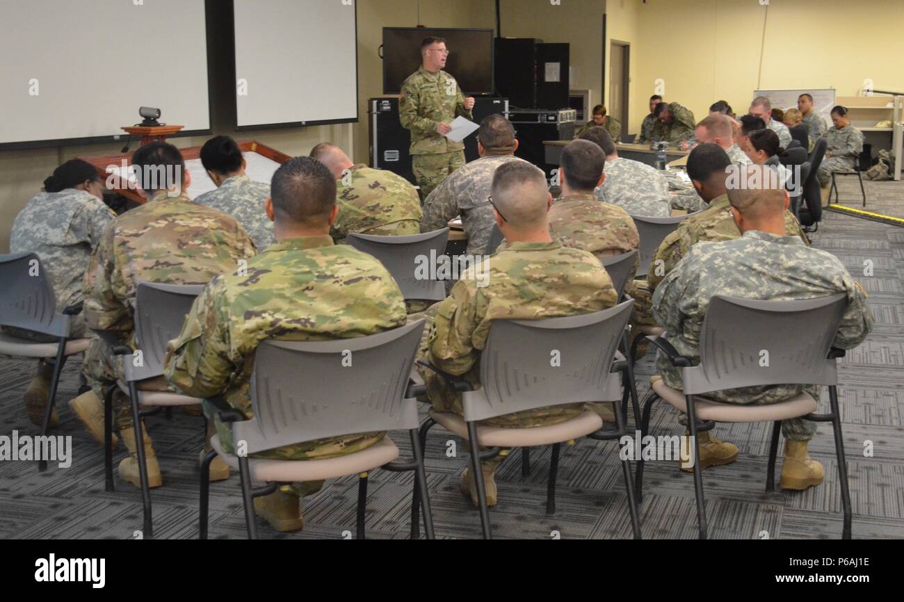 FORT CARSON, CO. – Soldiers from the 4th Sustainment Brigade receive a ...