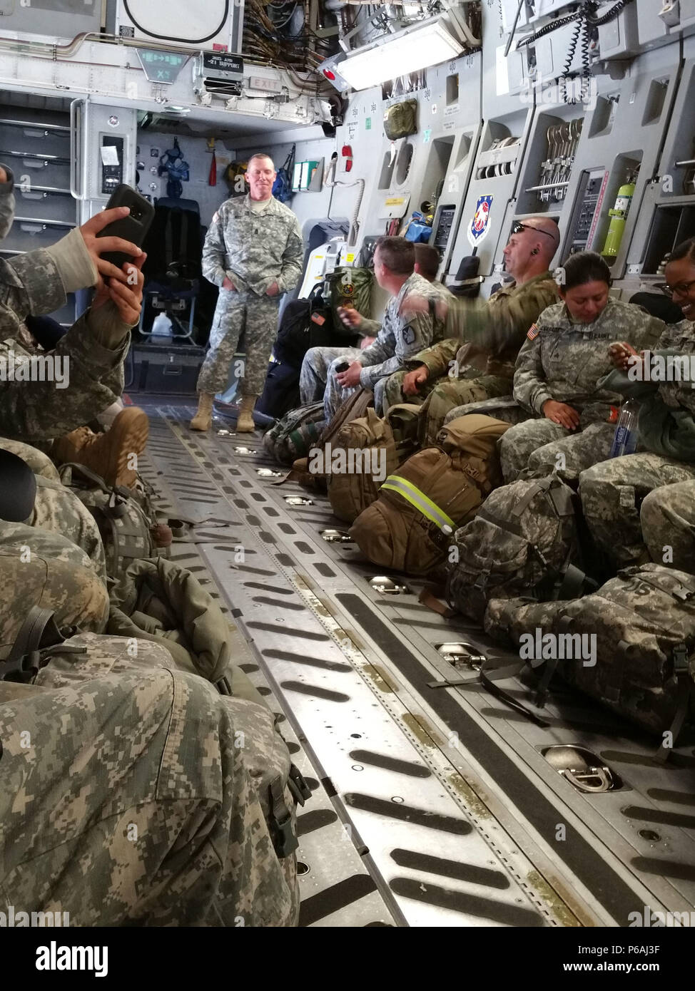 Command Sgt. Maj. Scott M. Witt speaks with members of the California ...