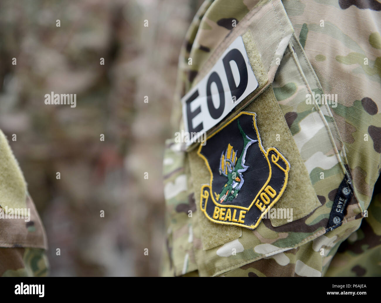 An EOD technician wears a 9th Civil Engineer Squadron explosive ...