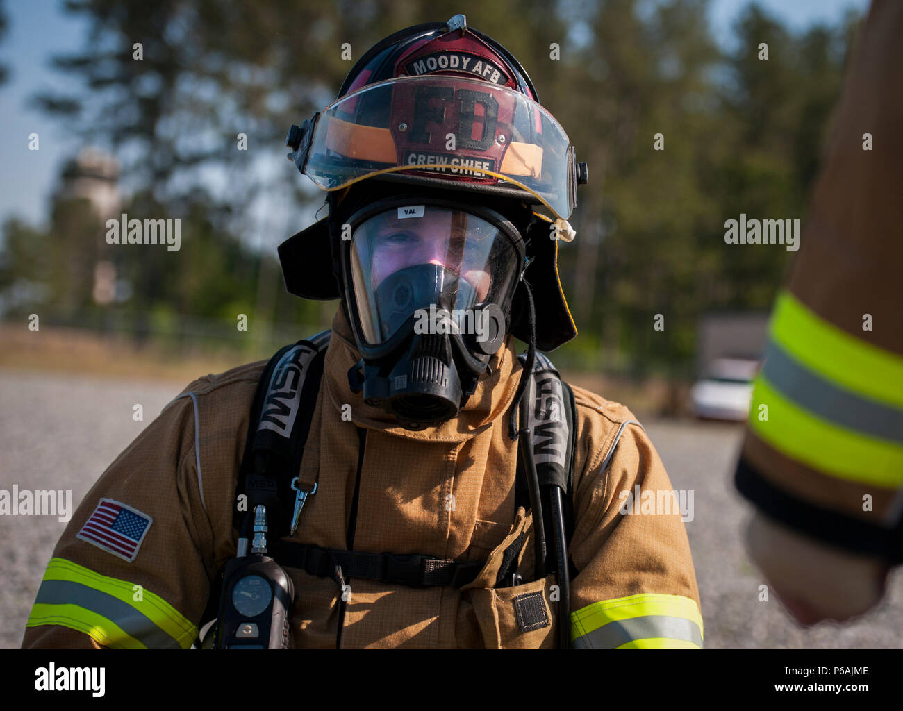 A firefighter from the 23d Civil Engineer Squadron takes a break during ...