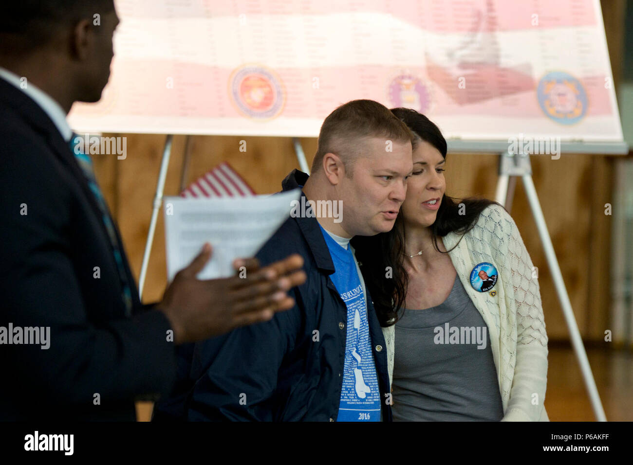 Mrs. Jennifer Legate is comforted by her brother after her ...