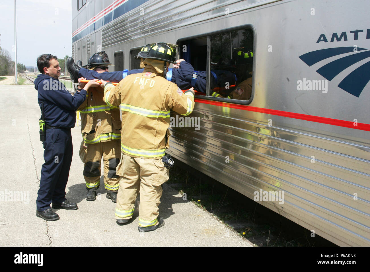 Personnel with the Directorate of Emergency Services Fire Department ...