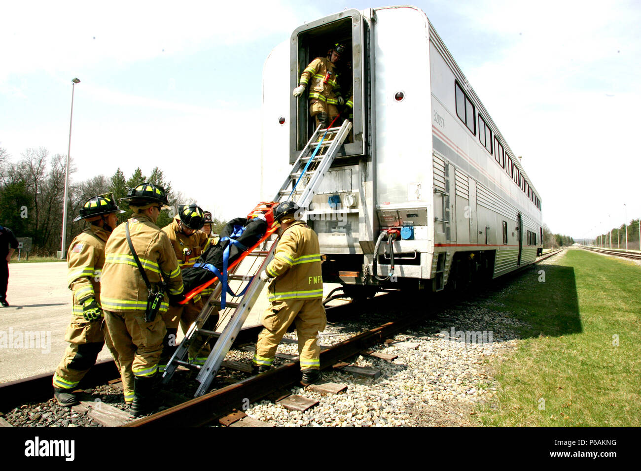 Personnel with the Directorate of Emergency Services Fire Department ...