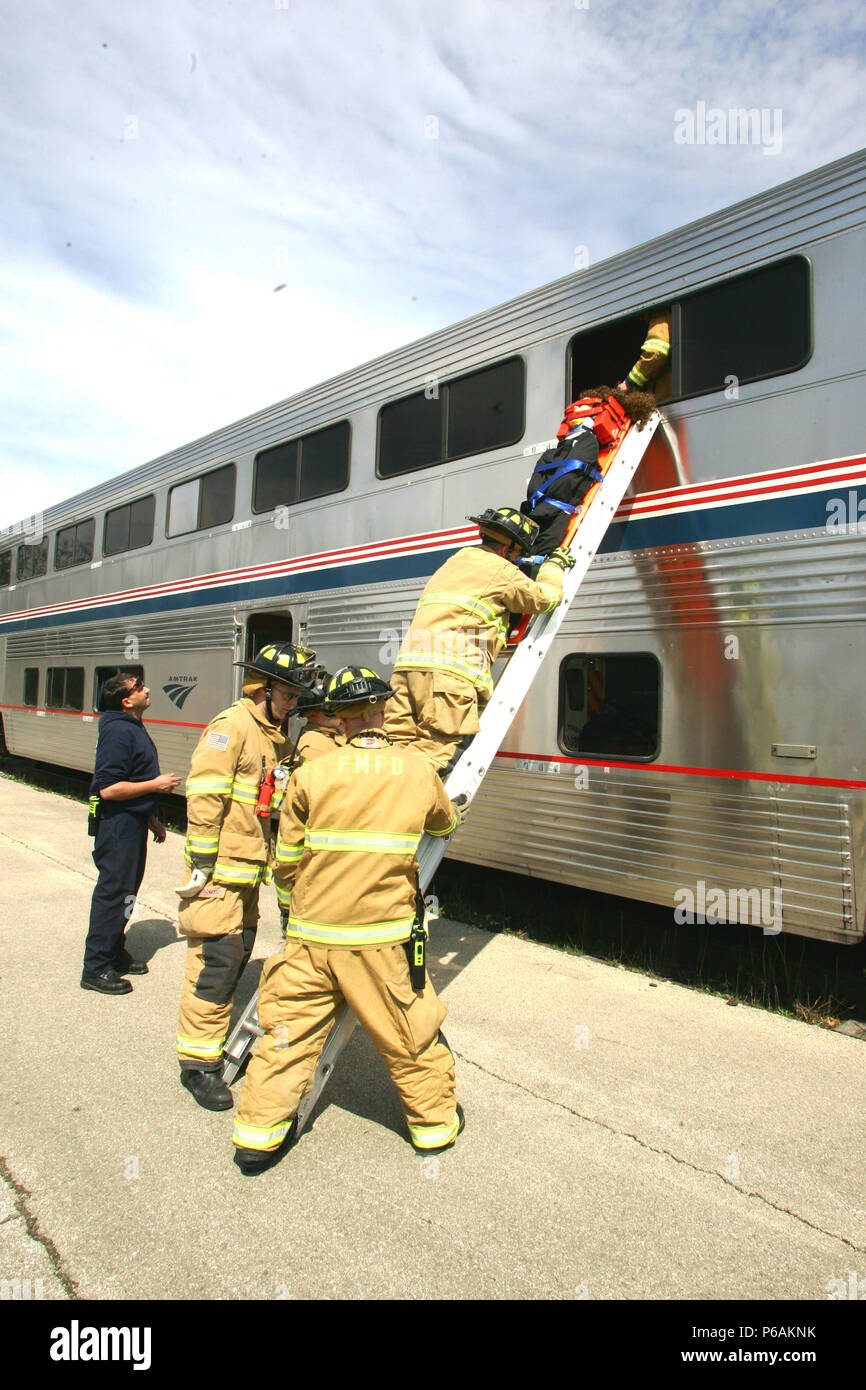 Personnel with the Directorate of Emergency Services Fire Department ...