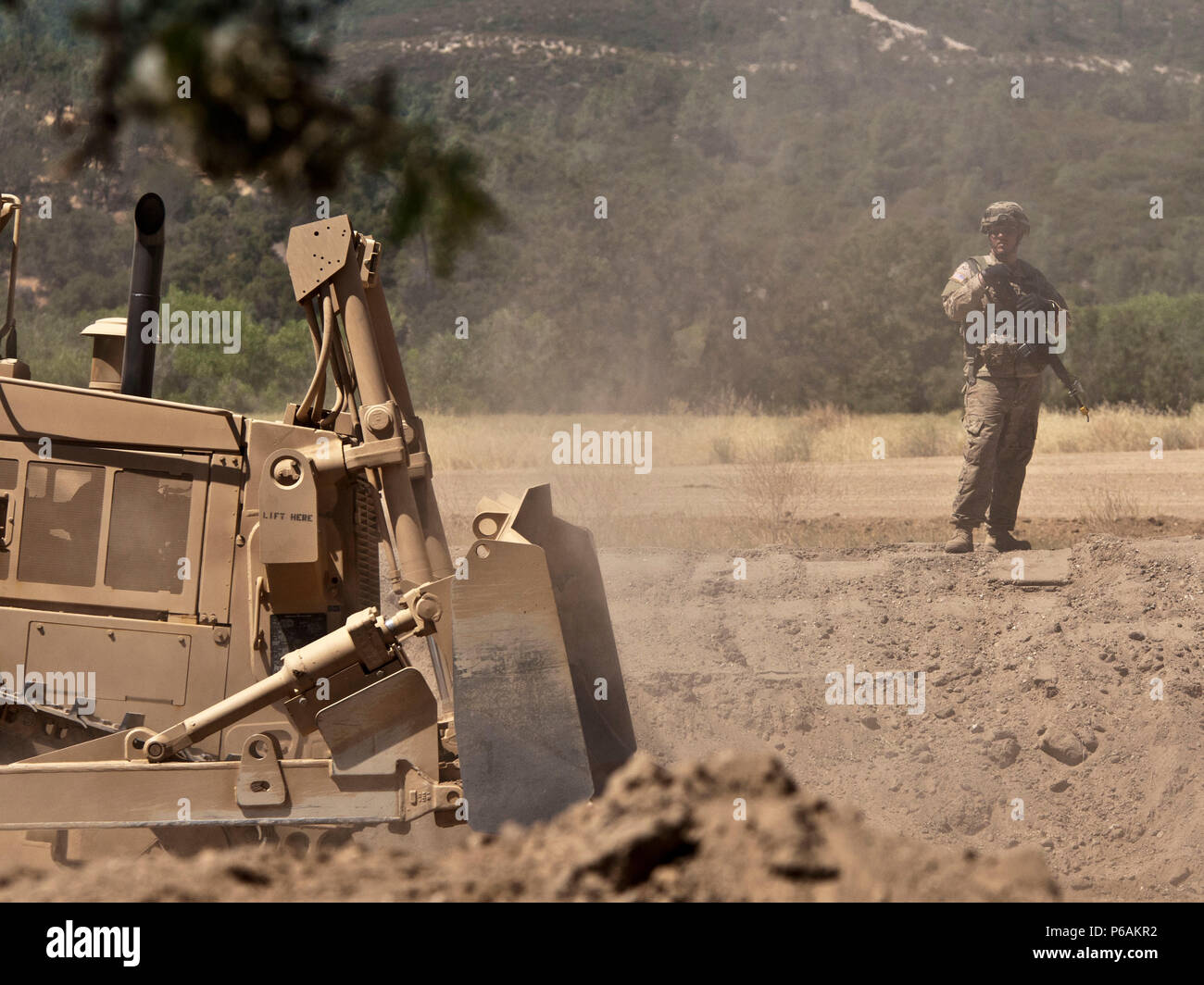 Army Reserve Sgt. John Brownlee, a horizontal construction engineer ...
